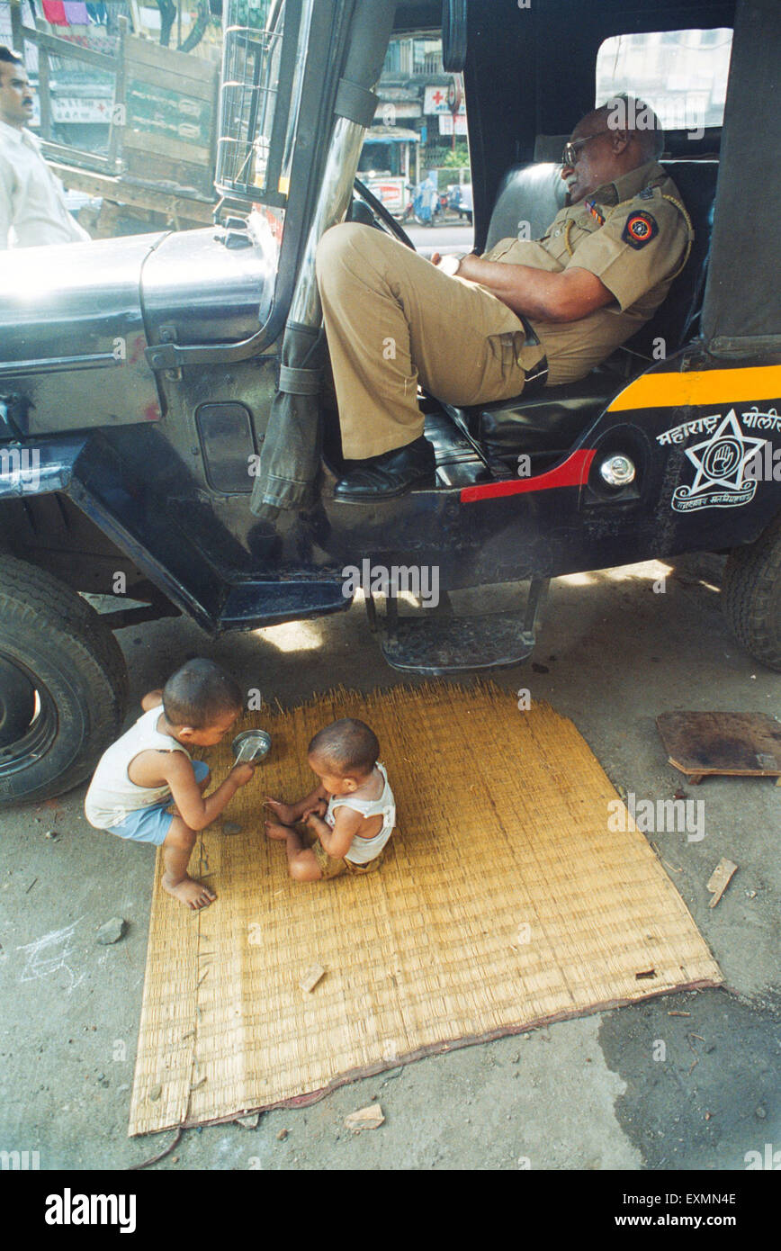 Police officer resting relaxing sleeping in Maharashtra Police jeep ...