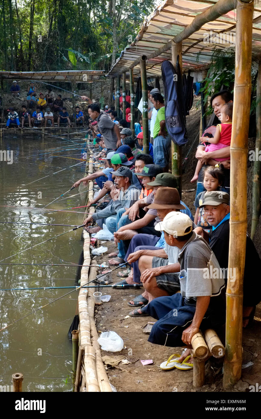 fishing indonesian style at a popular rural village man made pool near ...