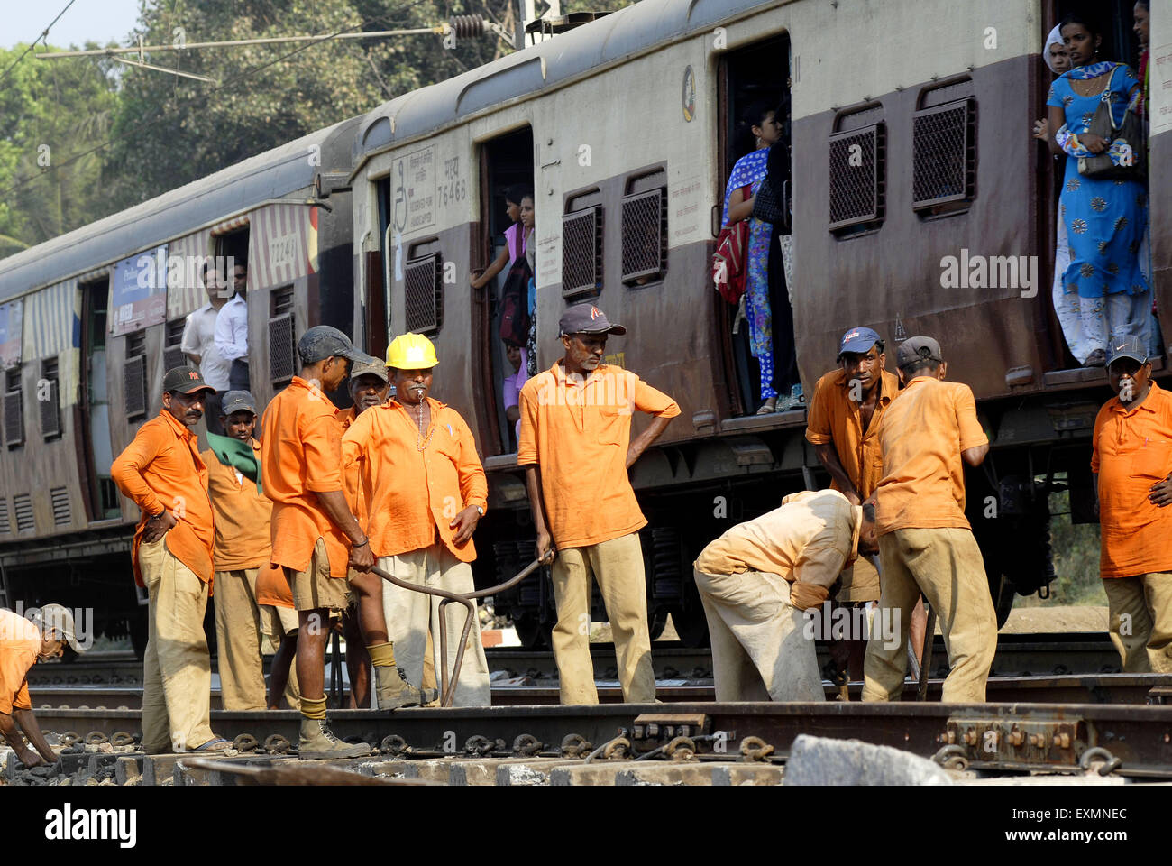 Railway workers repairing damaged railway tracks, Bombay, Mumbai ...