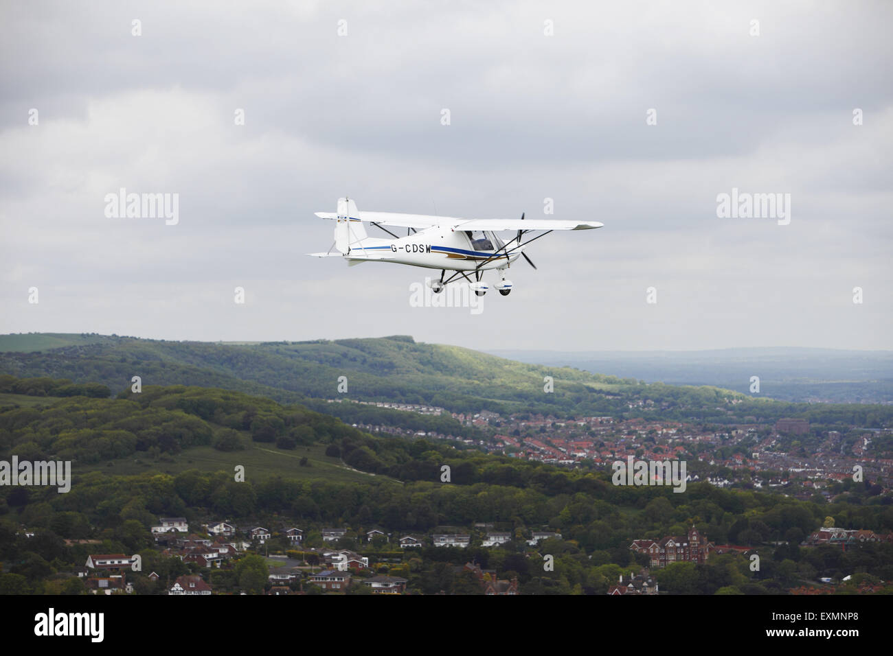 Aerial photograph of a microlight, a lightweight modern airplane, over ...