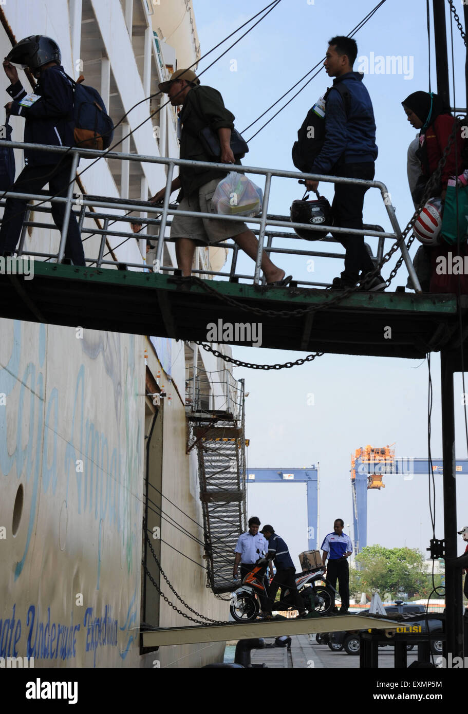 Jakarta, Indonesia. 15th July, 2015. Passengers board a ferry ship in ...