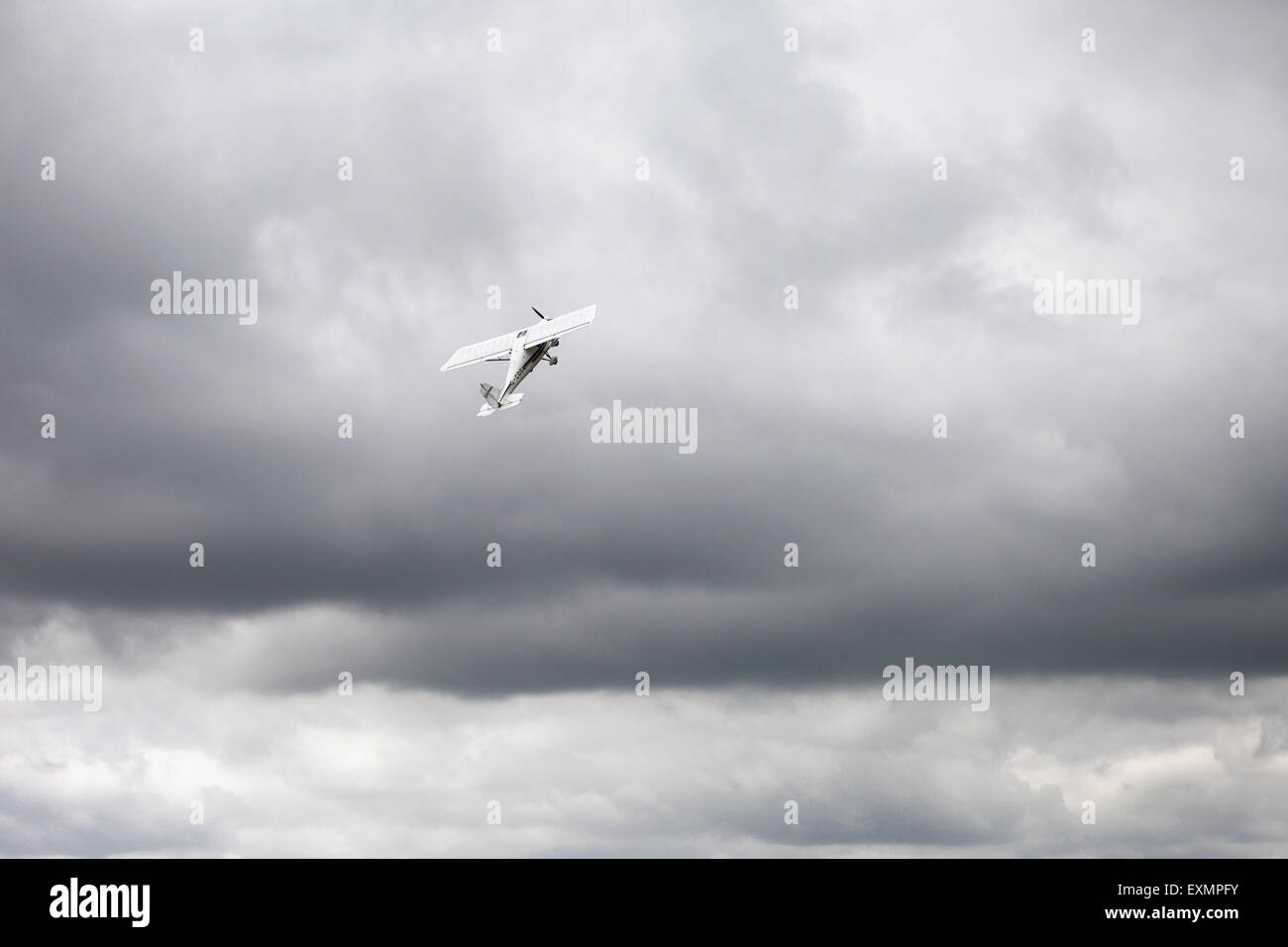 Aerial photograph of a microlight, a lightweight modern airplane, over ...