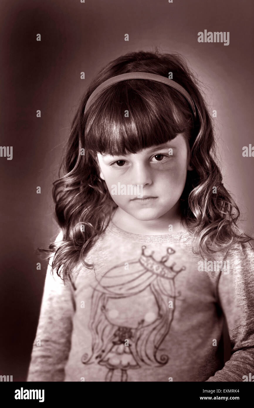 Portrait of young girl with a bruise or black eye on her left side ...