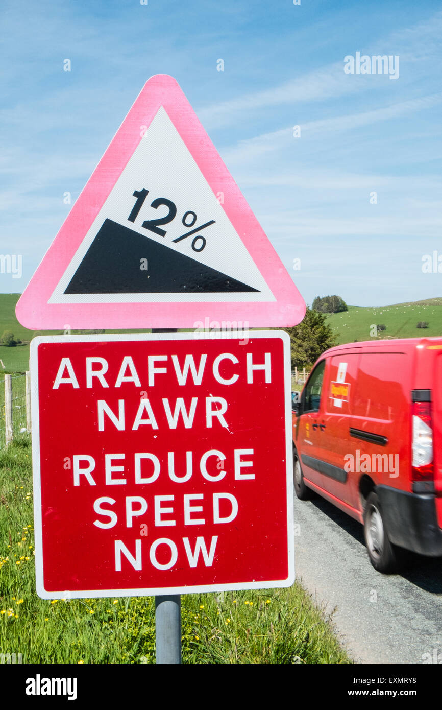 Warning sign bi-lingual,road,sign,steep,road,ahead in quiet remote ...