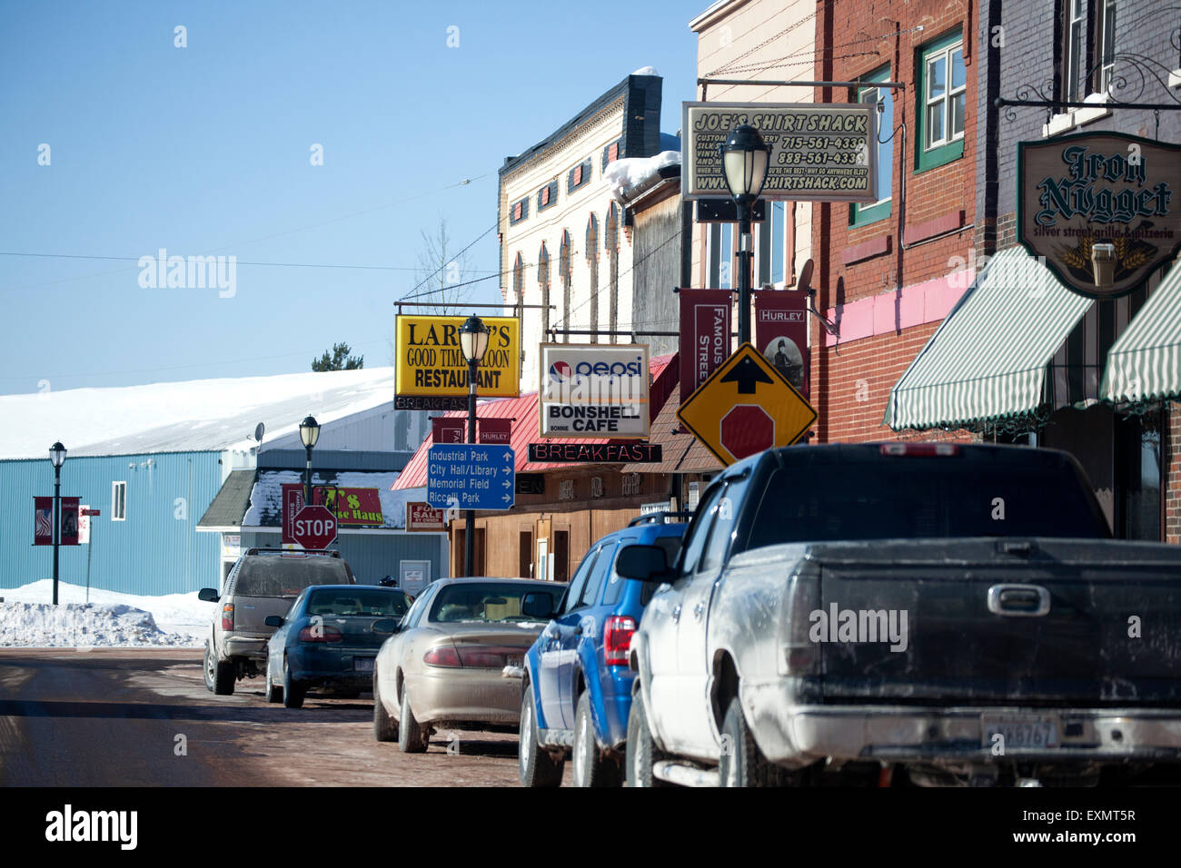 The many shops, stores and restaurants lining the downtown street ...