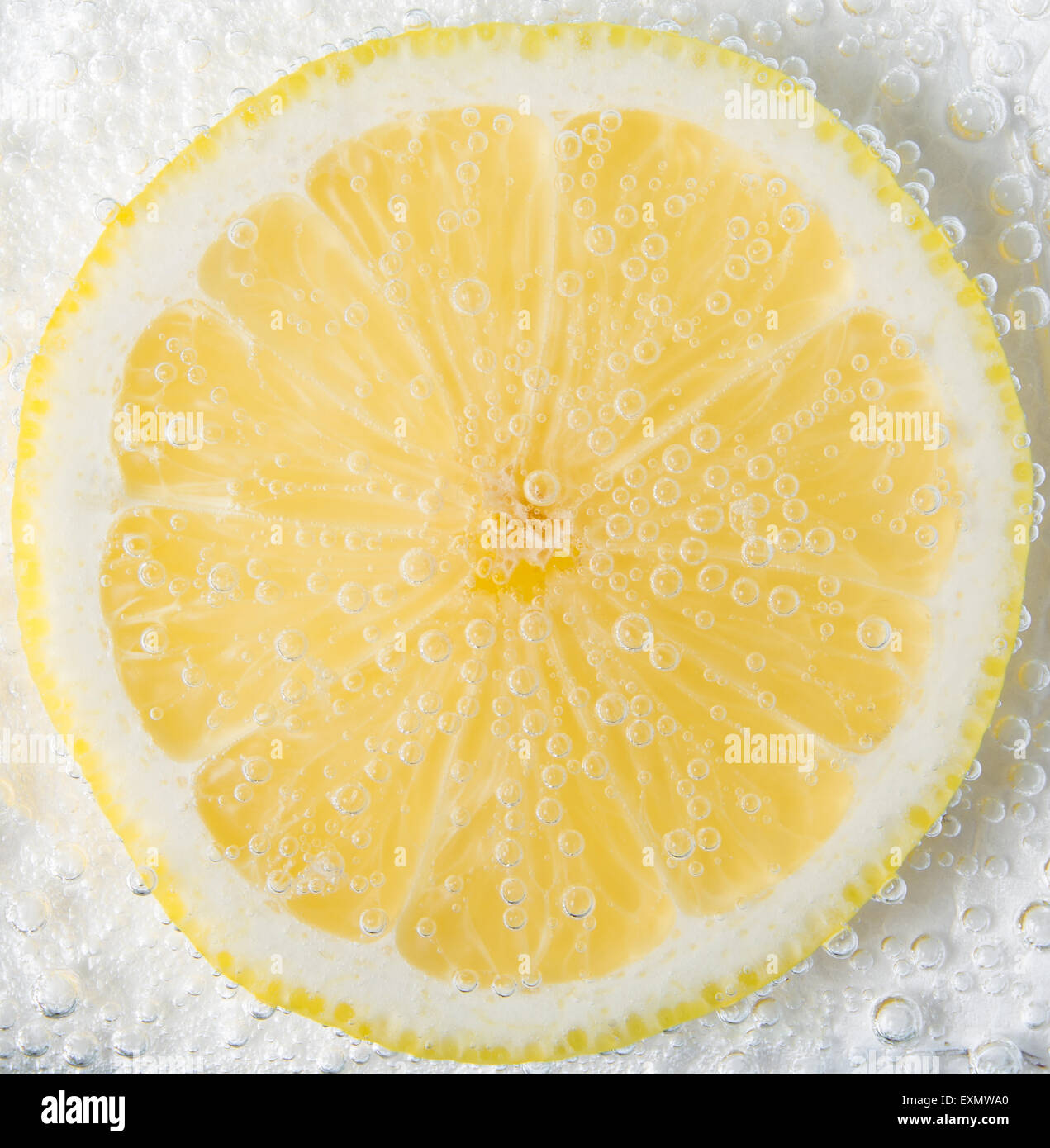 lemon in bubbles Stock Photo - Alamy