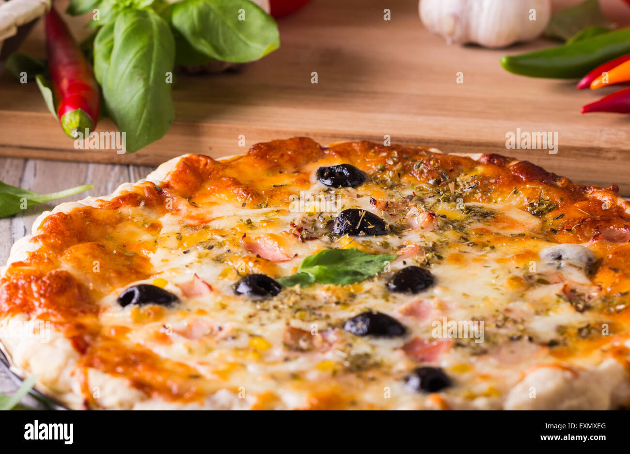 Homemade Pizza with mozzarella and ham Stock Photo - Alamy