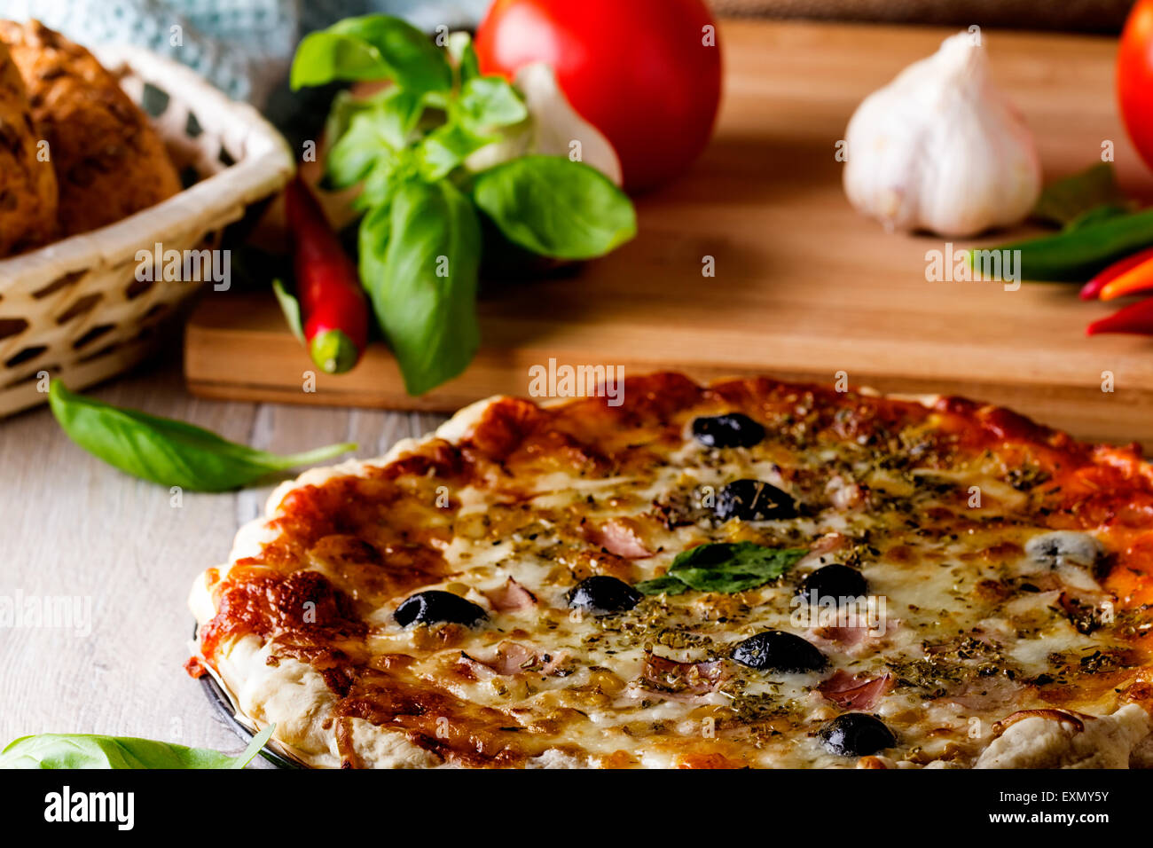 Homemade Pizza with mozzarella and ham Stock Photo - Alamy