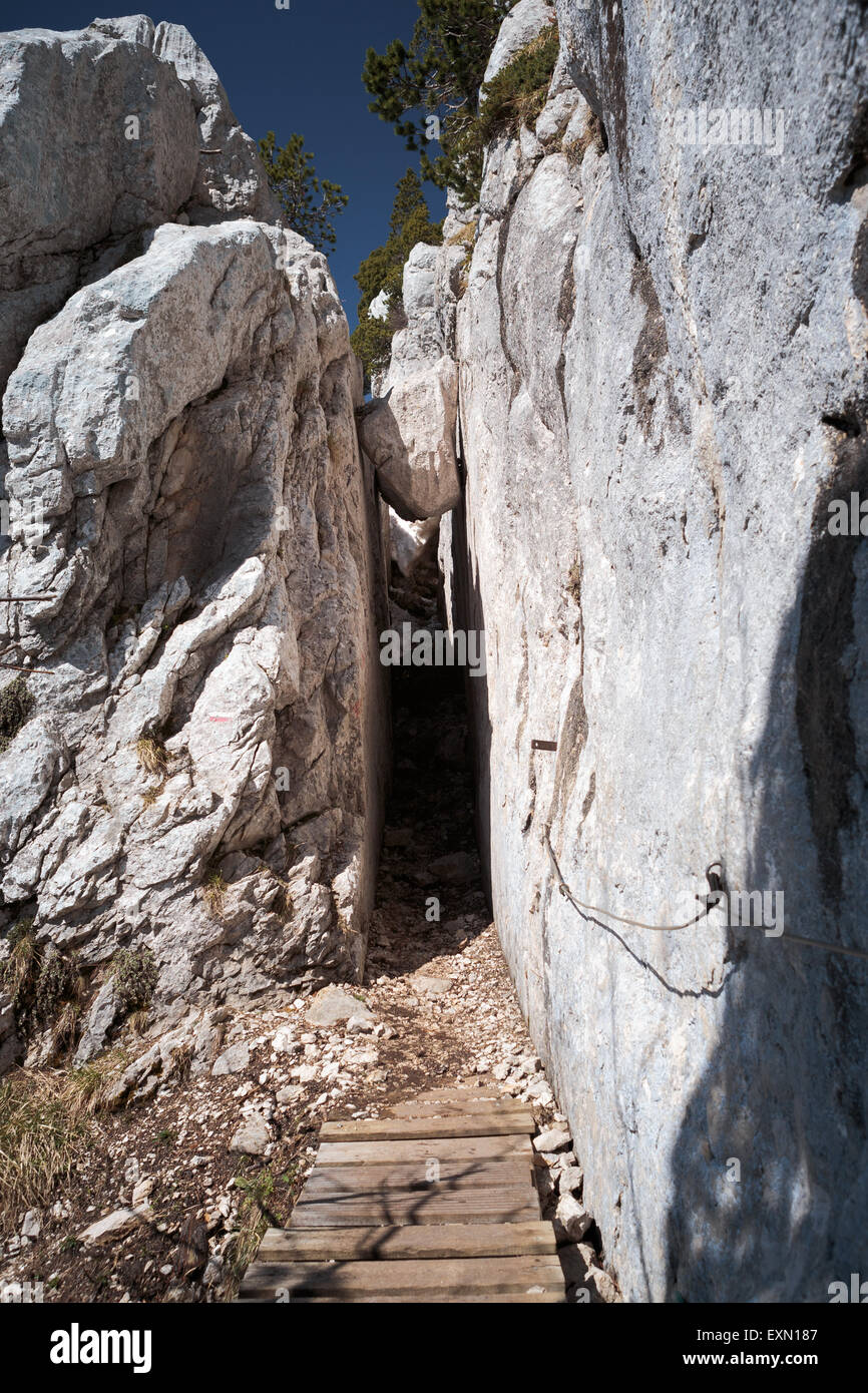 Rock passageway for hikers in the Chartreuse mountains, French Alps ...