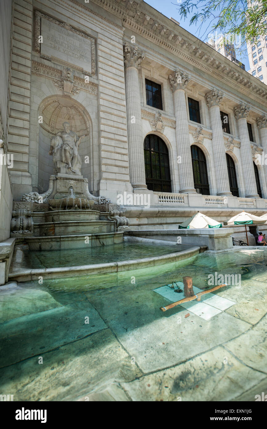 The fountain Truth at the entrance of the New York Public Library flows ...