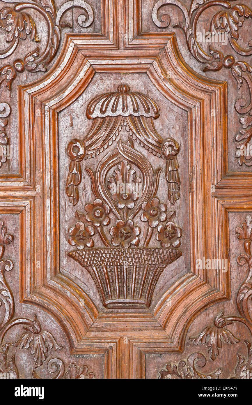 GRANADA, SPAIN - MAY 29, 2015: The detail of carved baroque door of ...