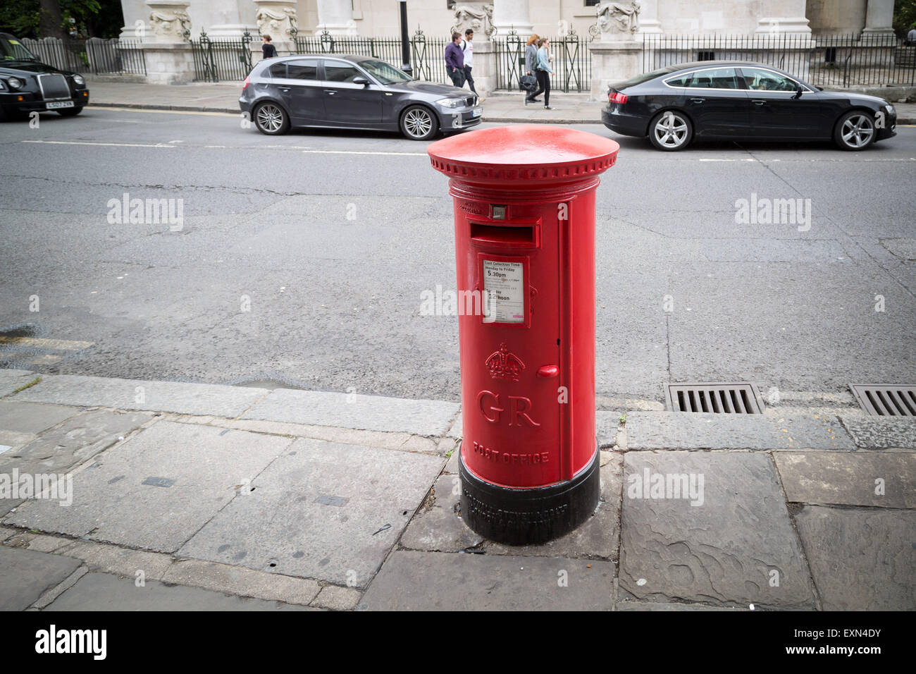 Traditional British red post box seen in London, UK Stock Photo - Alamy