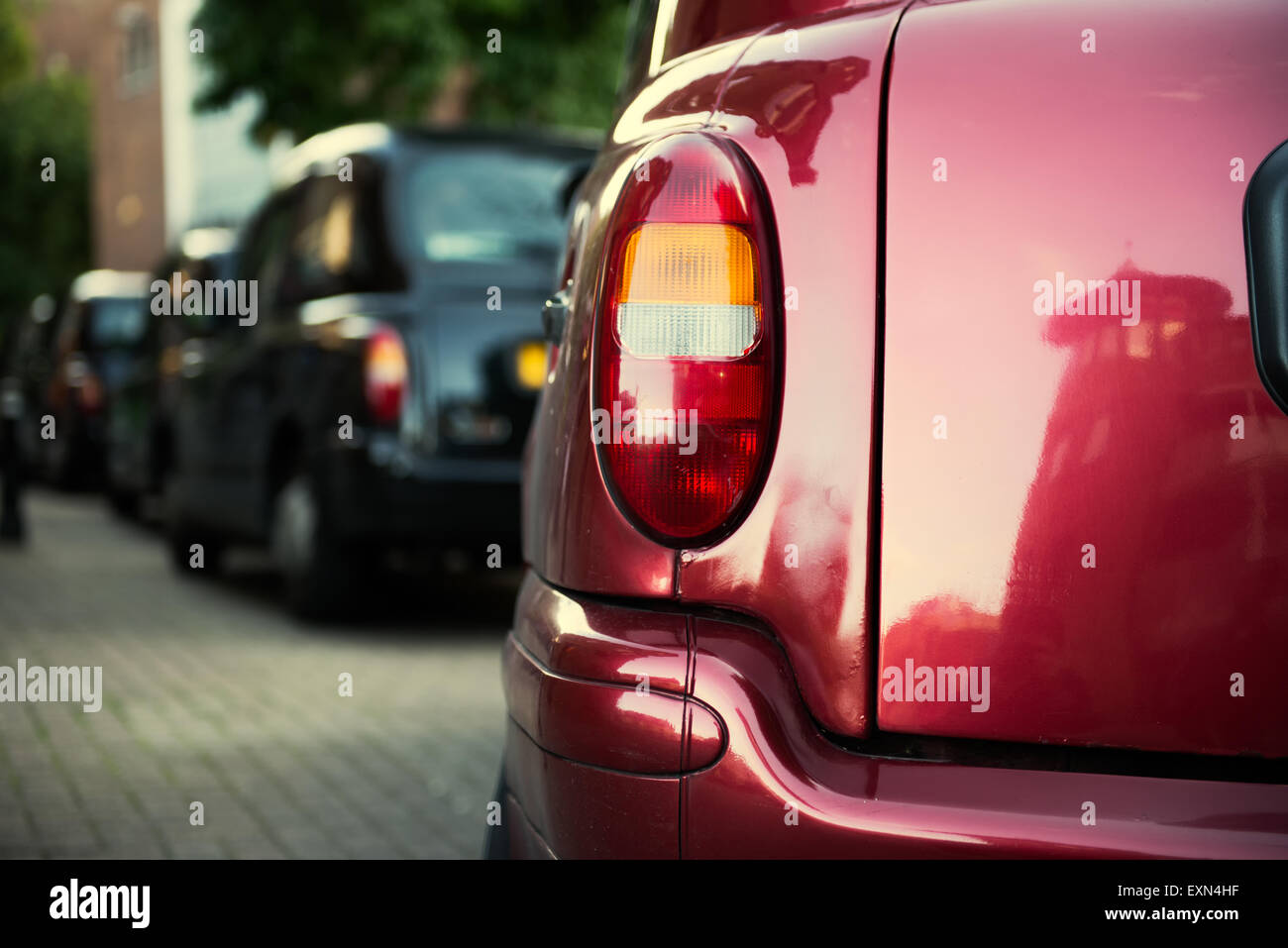 Red taxi cab rear lights close-up, London, UK Stock Photo - Alamy