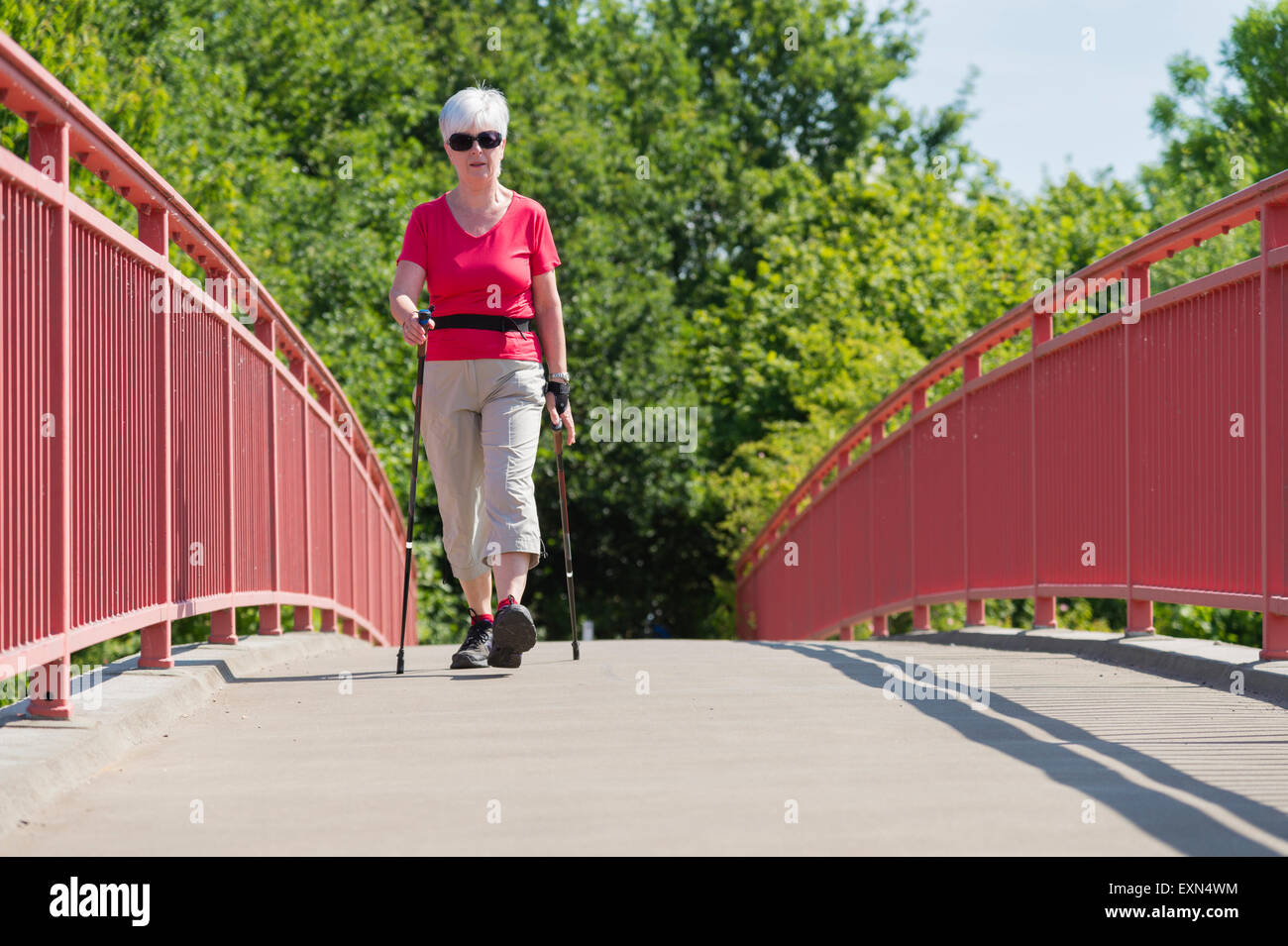 60 years old woman walking stick hi-res stock photography and images ...