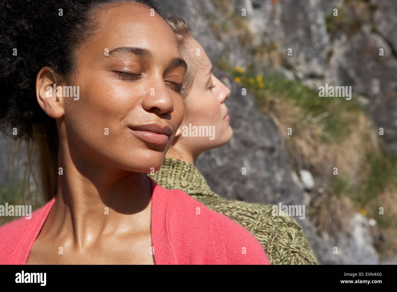 Two sunbathing women hi-res stock photography and images - Alamy