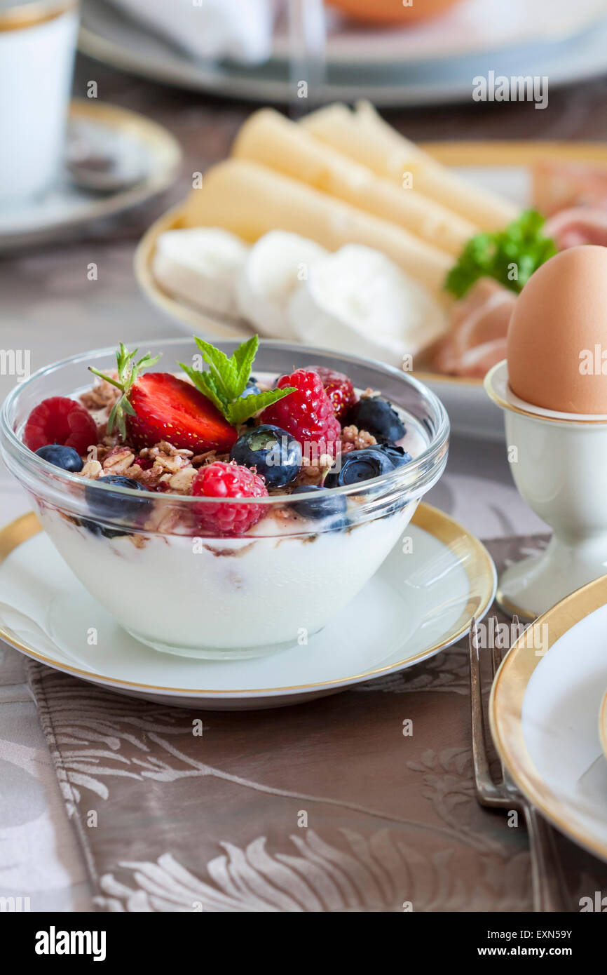 Breakfast, fresh fruit muesli in bowl Stock Photo - Alamy
