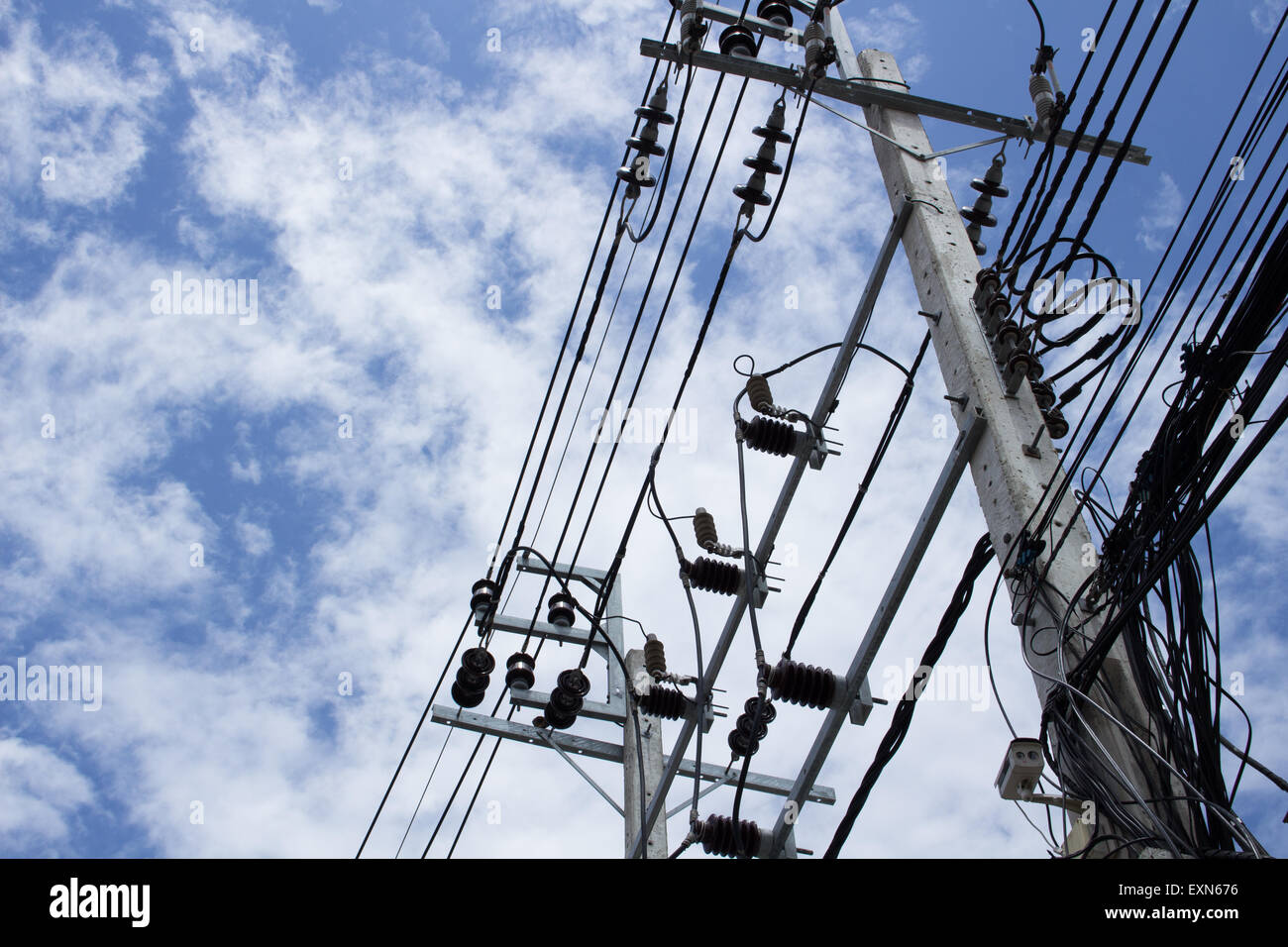 electricity post with cloud blue sky Stock Photo - Alamy