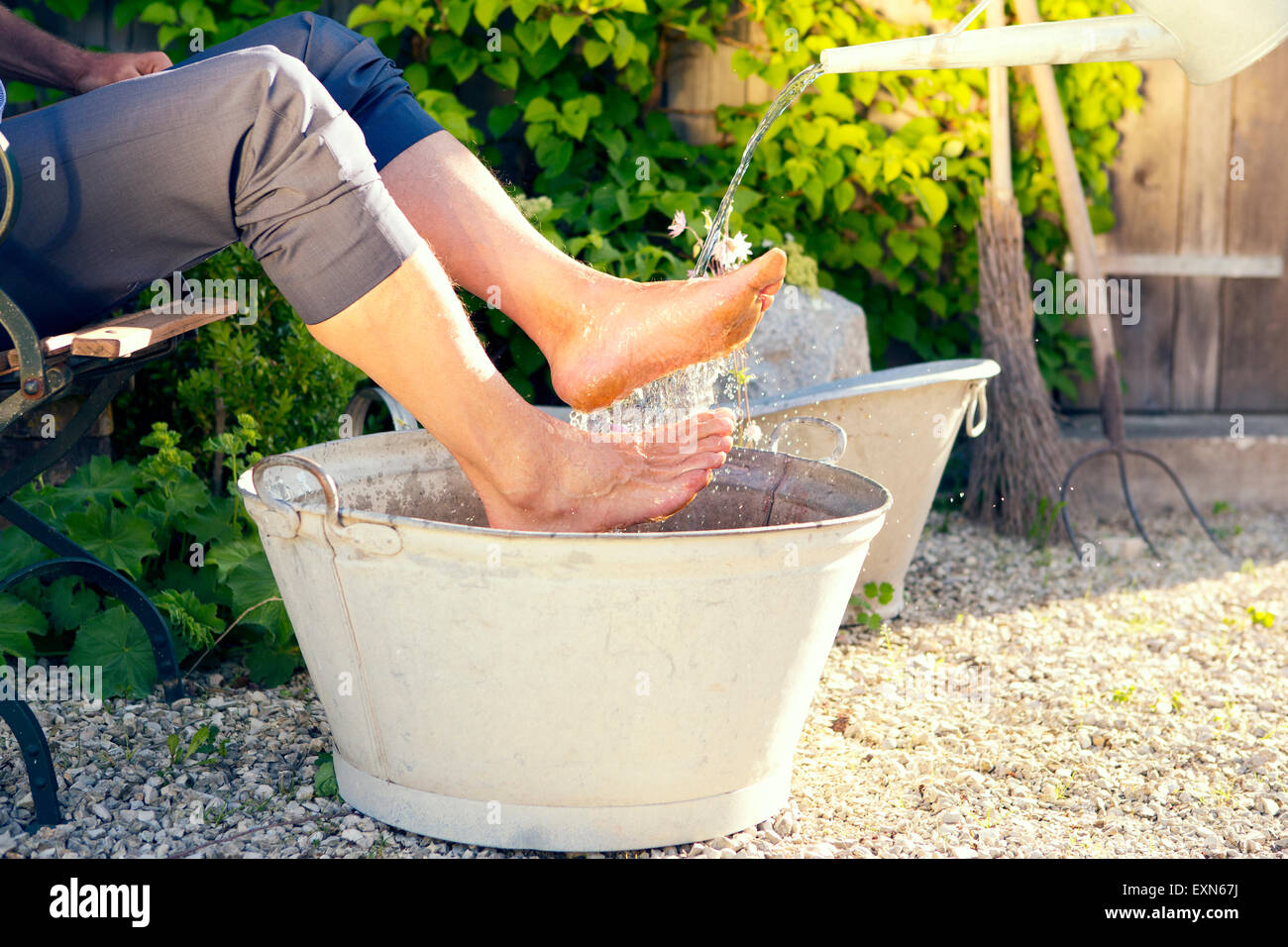 Man washing his foot hi-res stock photography and images - Alamy