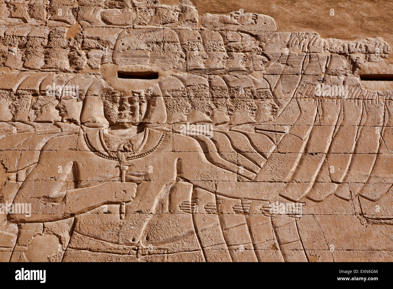 Ancient carvings on the walls found at the temple of Idfu in Egypt ...