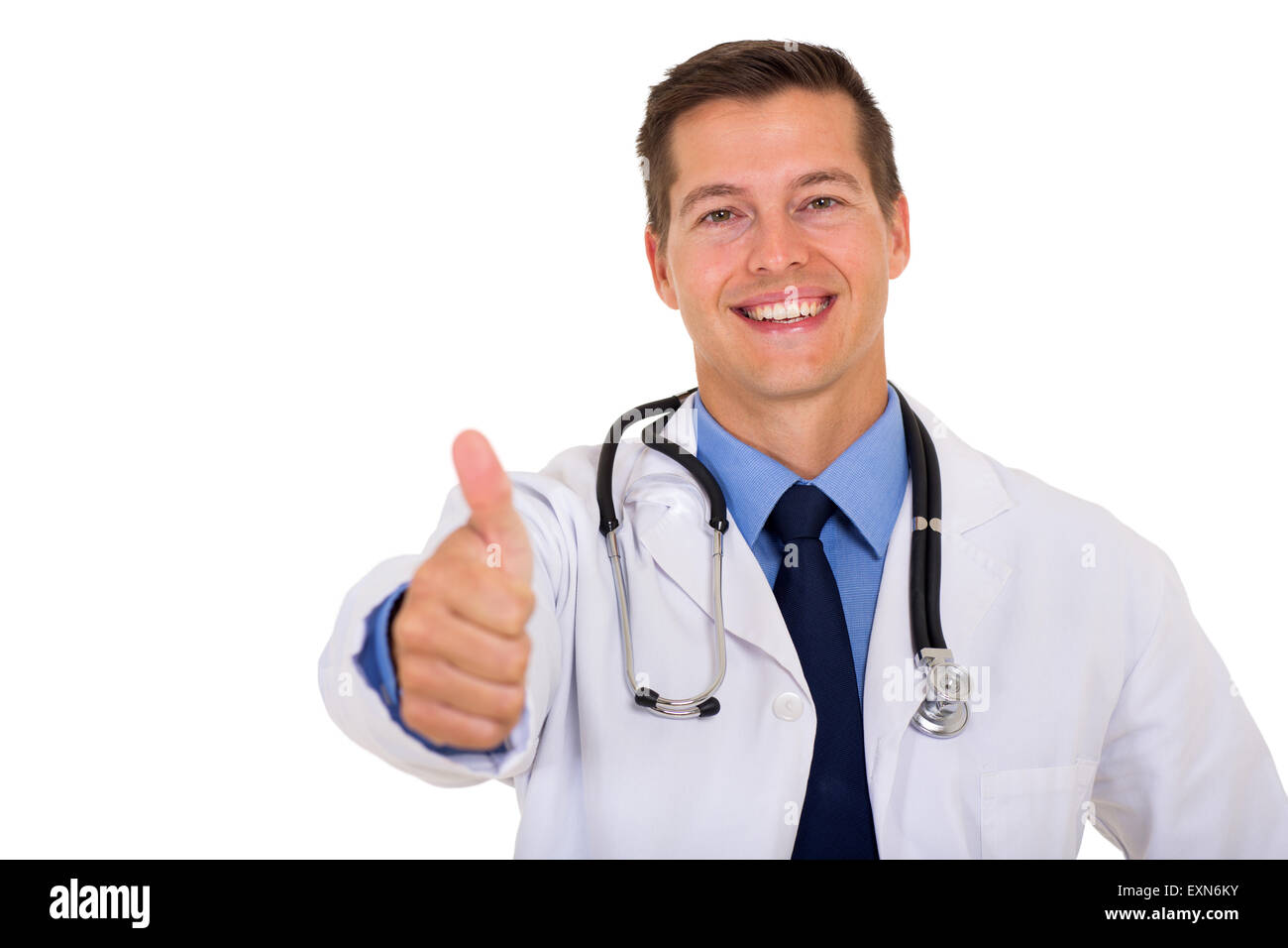 handsome health care worker giving thumb up on white background Stock ...