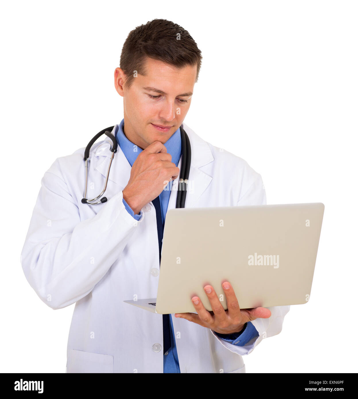 modern young doctor reading email on his laptop Stock Photo - Alamy