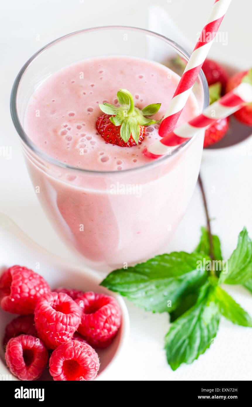 Glass of raspberry strawberry smoothie Stock Photo - Alamy