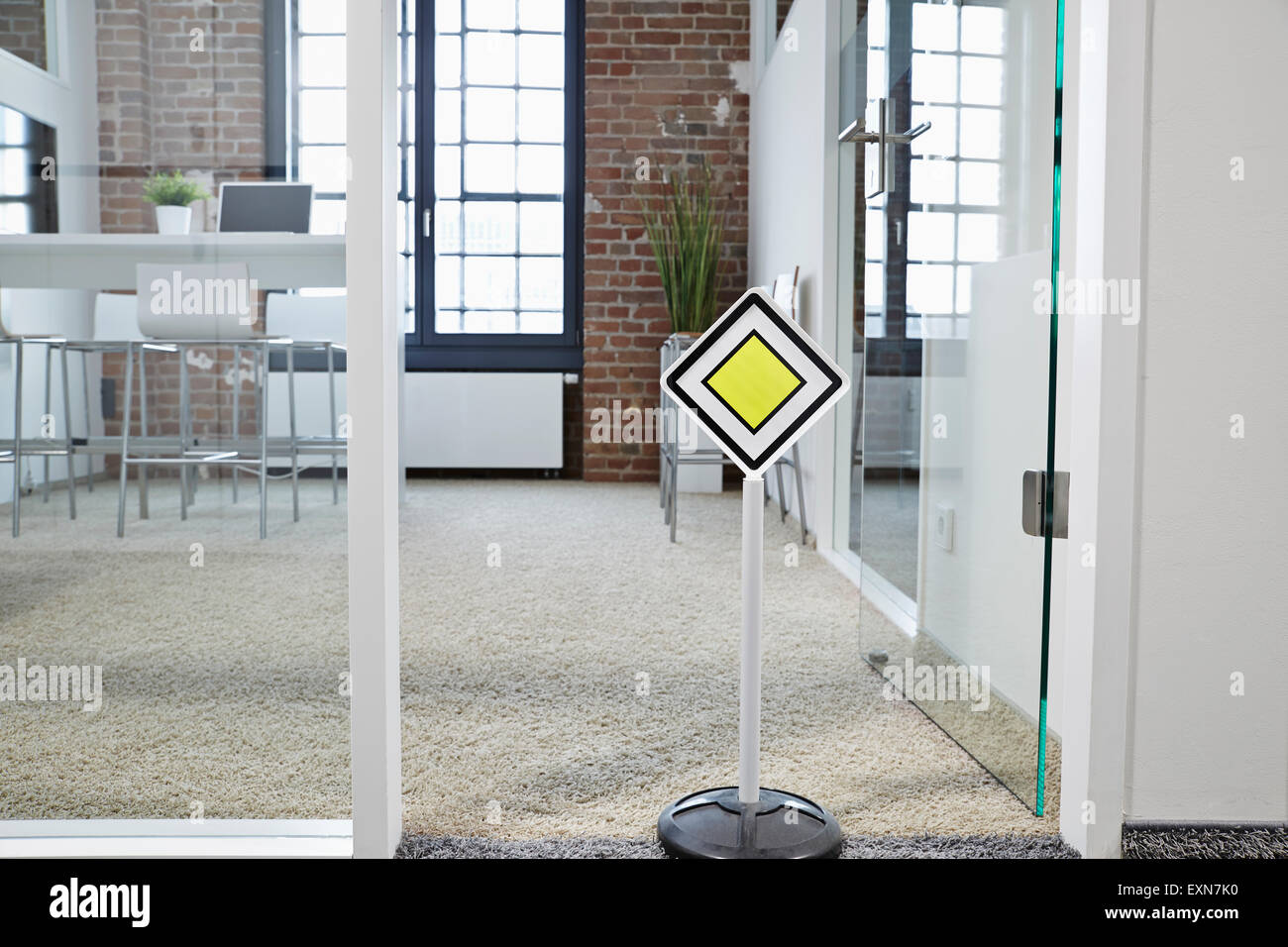 Right of way sign in modern open plan office Stock Photo - Alamy