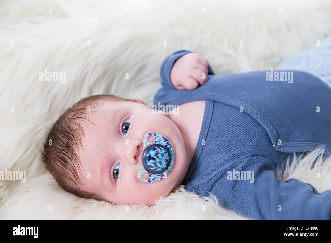 Baby boy with pacifier hi-res stock photography and images - Alamy