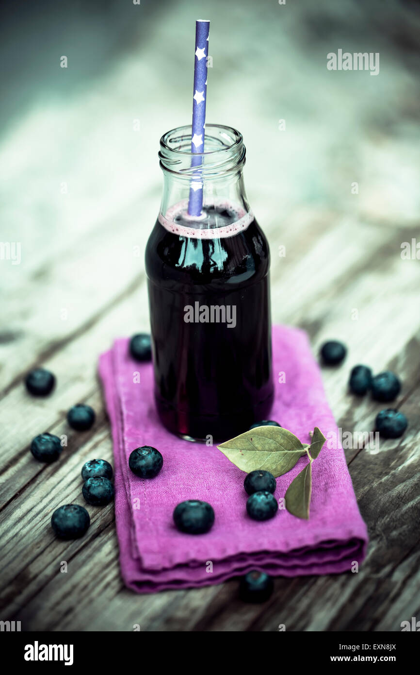 Bluberry juice in glass bottle hi-res stock photography and images - Alamy