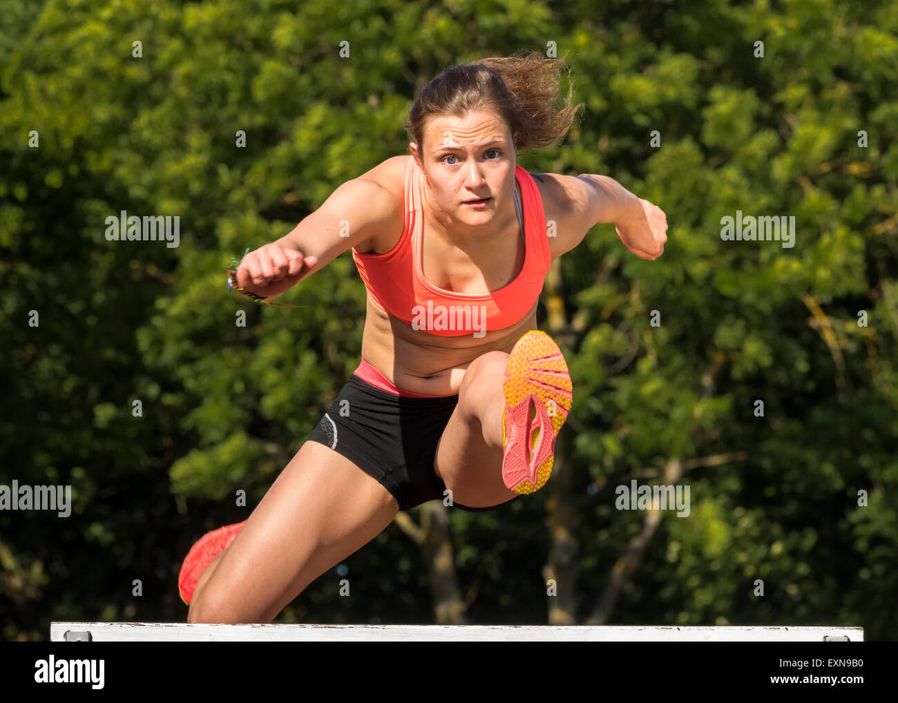 Athletics crossing hi-res stock photography and images - Alamy