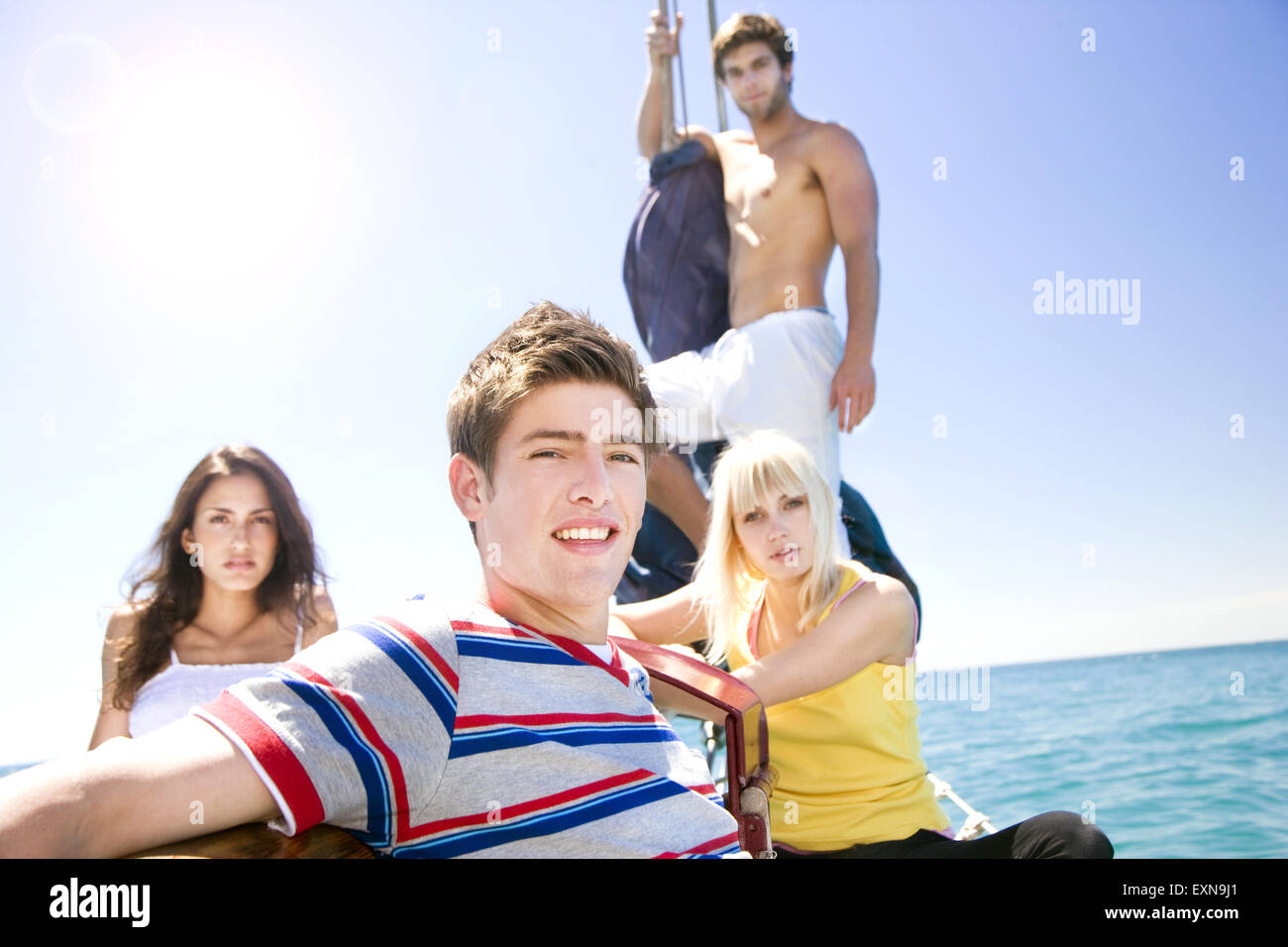 Friends on a sailing ship Stock Photo - Alamy