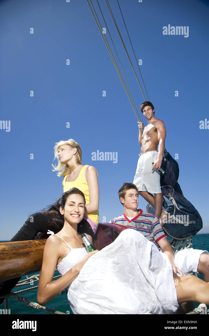 Friends on a sailing ship Stock Photo - Alamy
