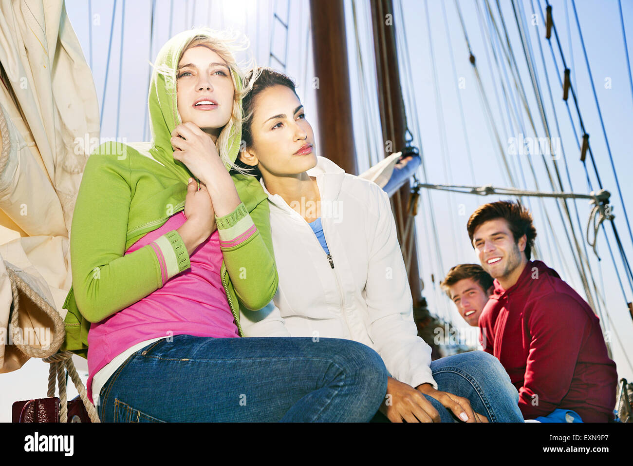 Friends on a sailing ship Stock Photo - Alamy