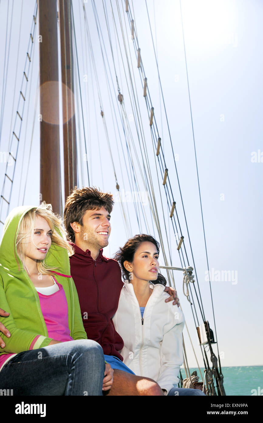Friends on a sailing ship Stock Photo - Alamy