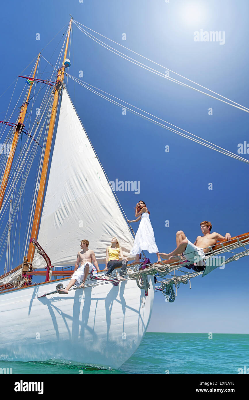 Friends on bow of a sailing ship Stock Photo - Alamy