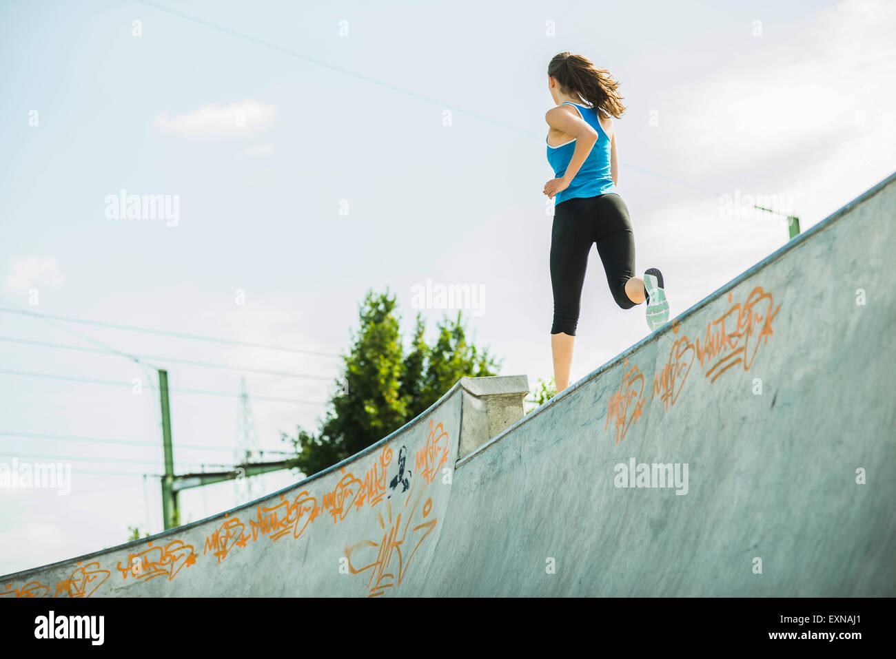 Woman running fast sports wear hi-res stock photography and images - Alamy