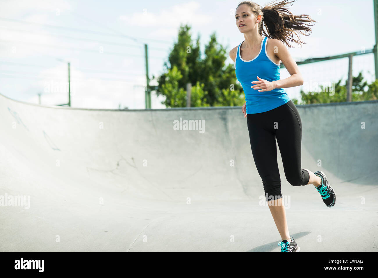 Woman running fast sports wear hi-res stock photography and images - Alamy