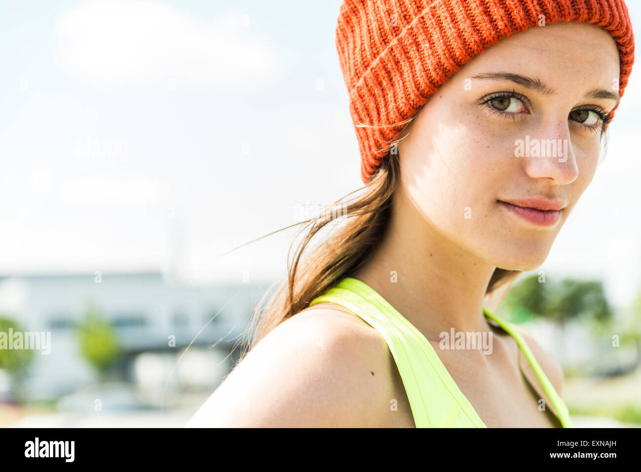 Portrait of young woman wearing woolly hat Stock Photo - Alamy