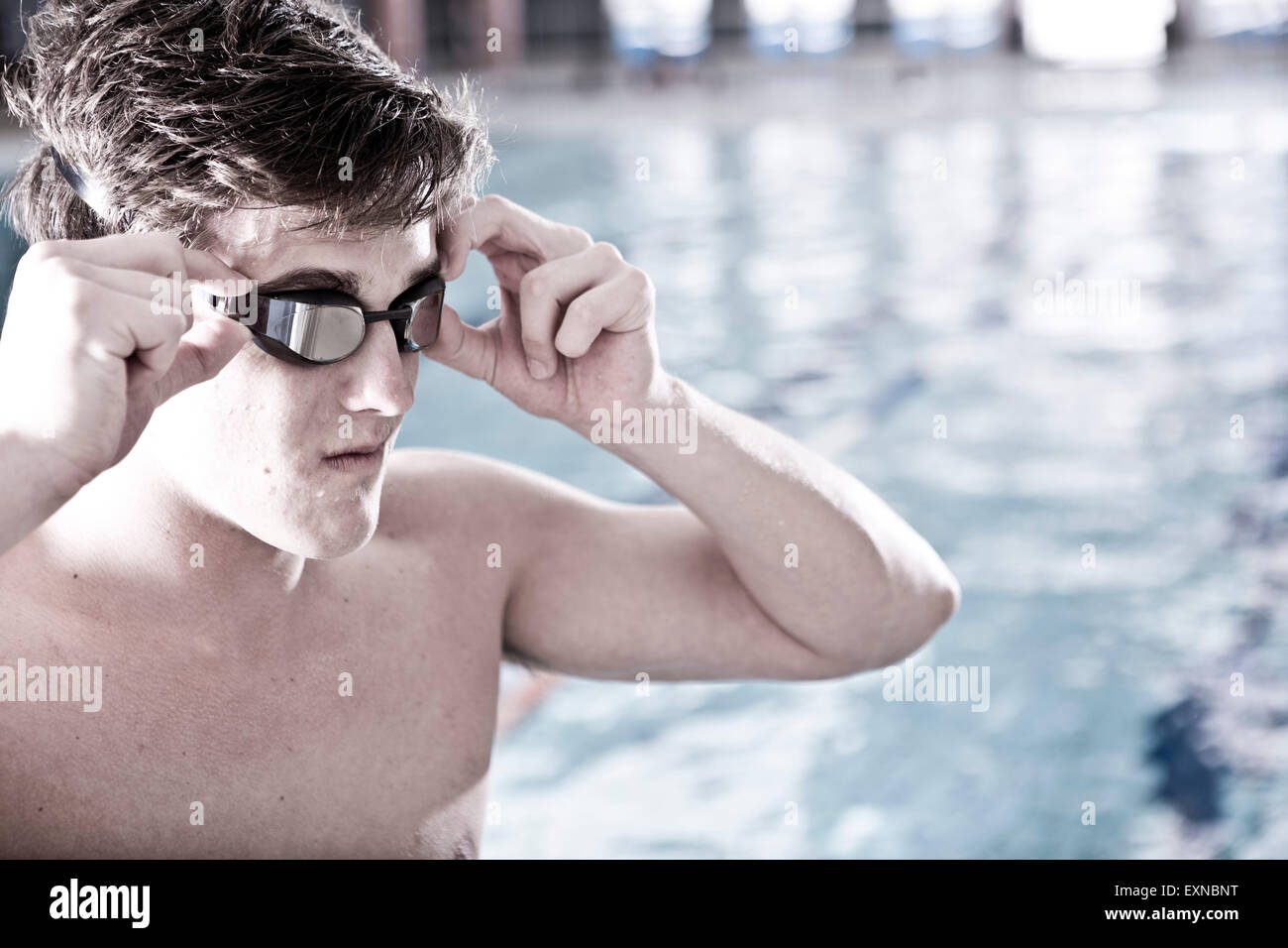 Swimmer putting on swimming goggles hi-res stock photography and images ...