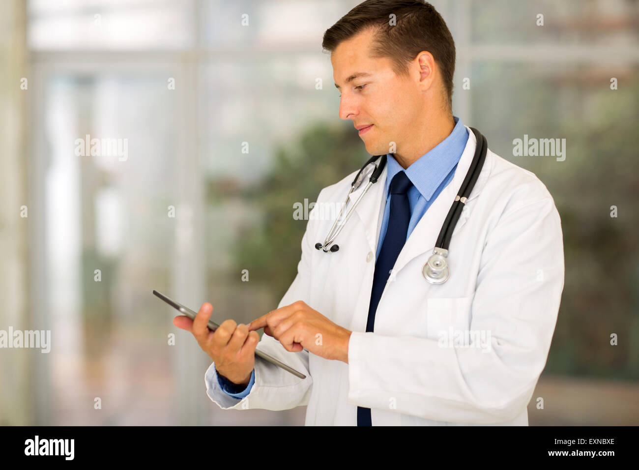 Doctor working office tablet computer hi-res stock photography and ...