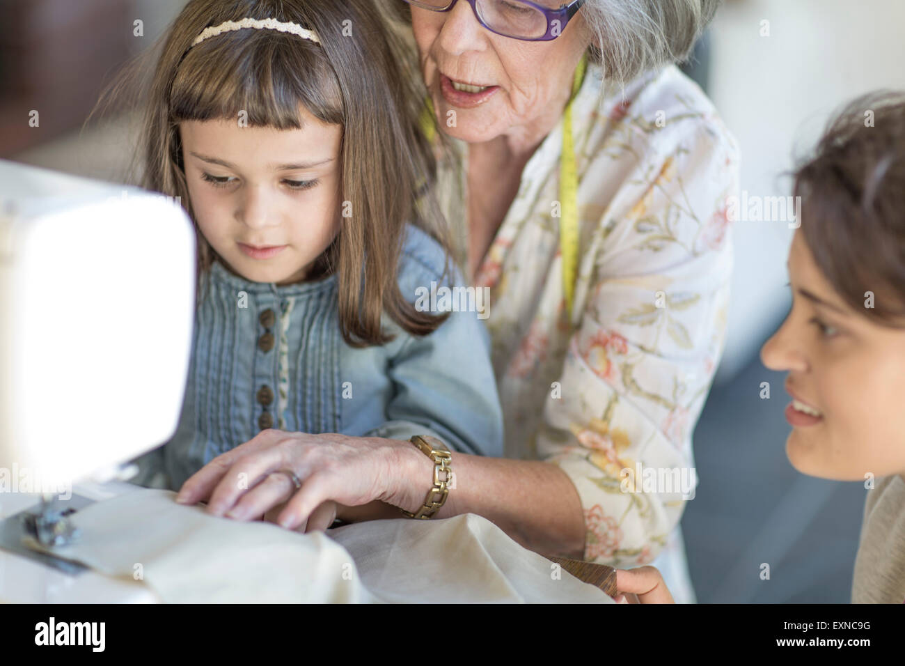 Grandmother mother sewing machine hi-res stock photography and images ...