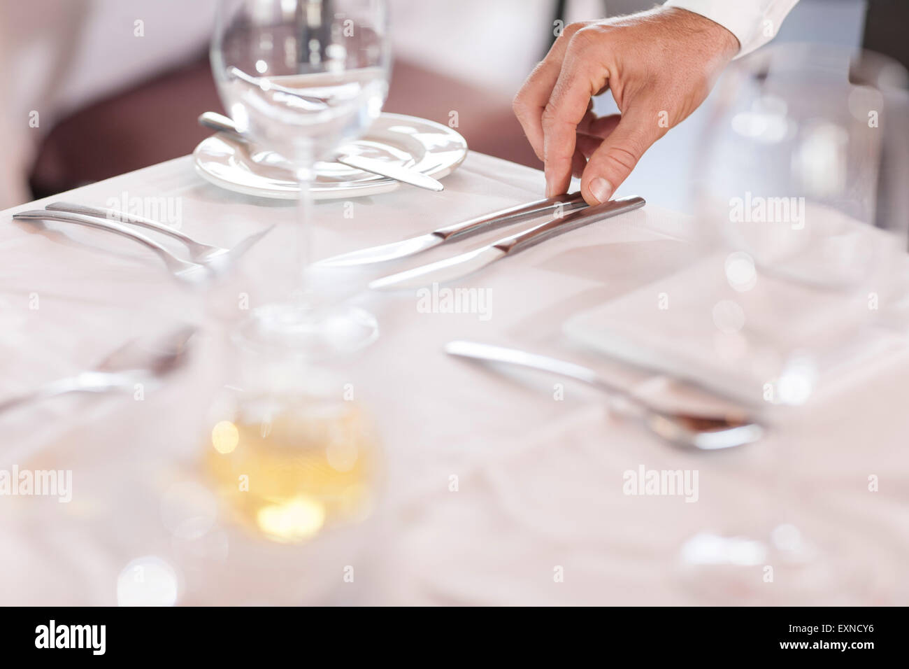 Waiter setting up tables hi-res stock photography and images - Alamy