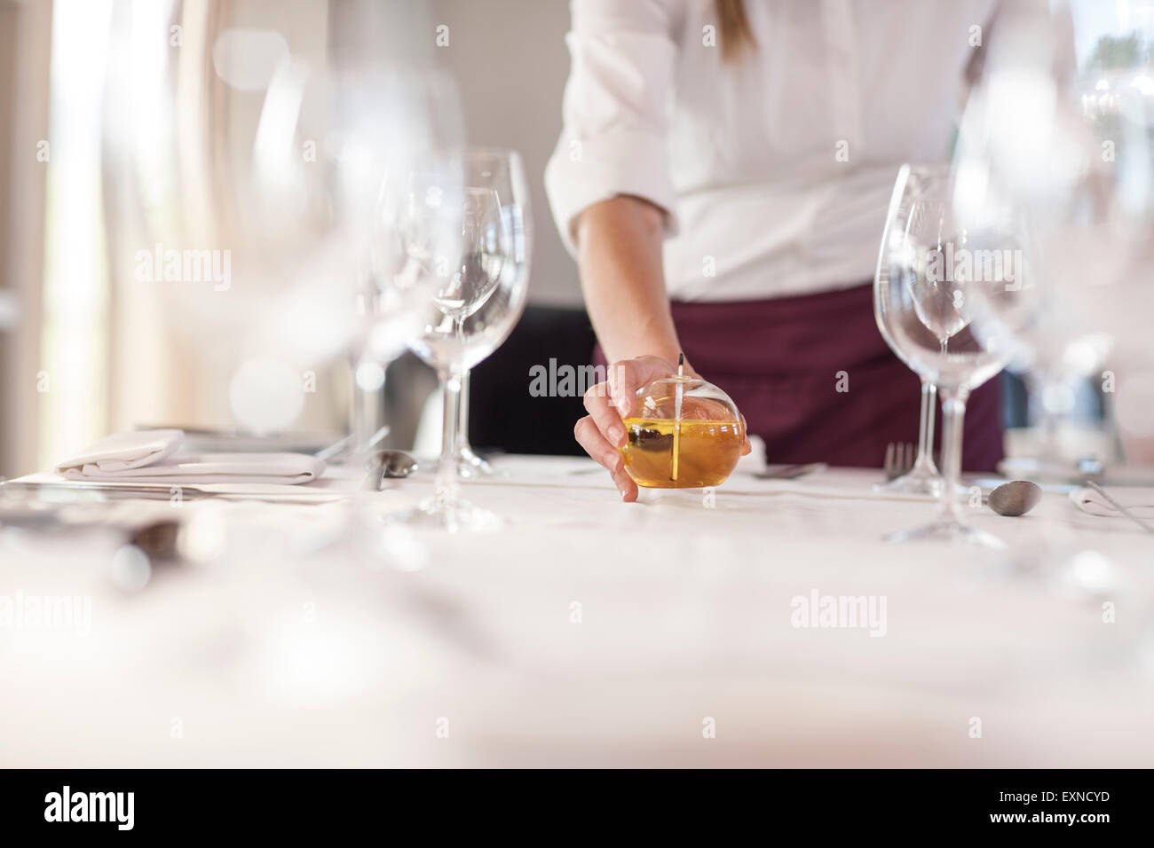 Waitress laying the table hi-res stock photography and images - Alamy