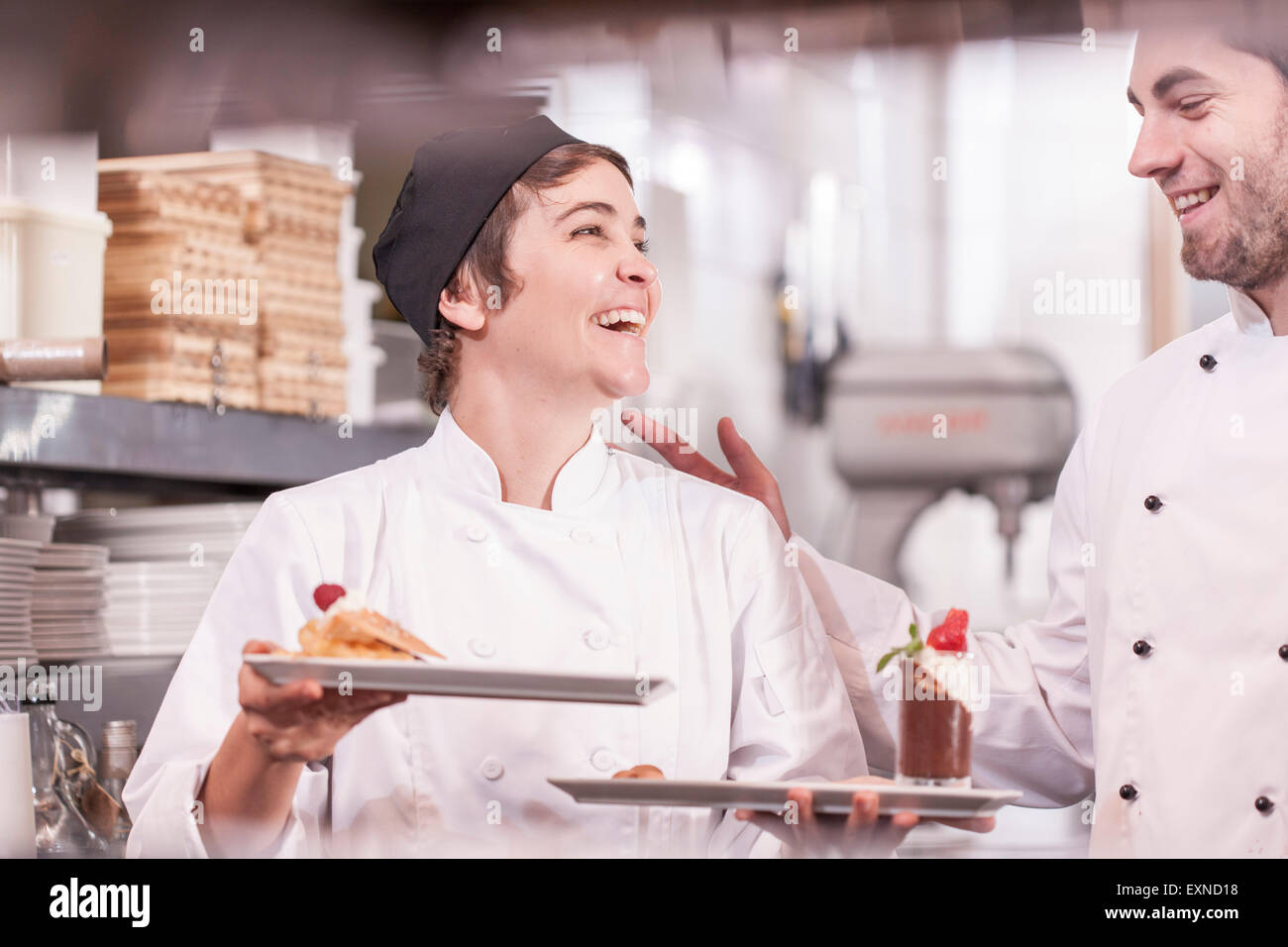 Chefs carrying desserts ready to eat Stock Photo - Alamy
