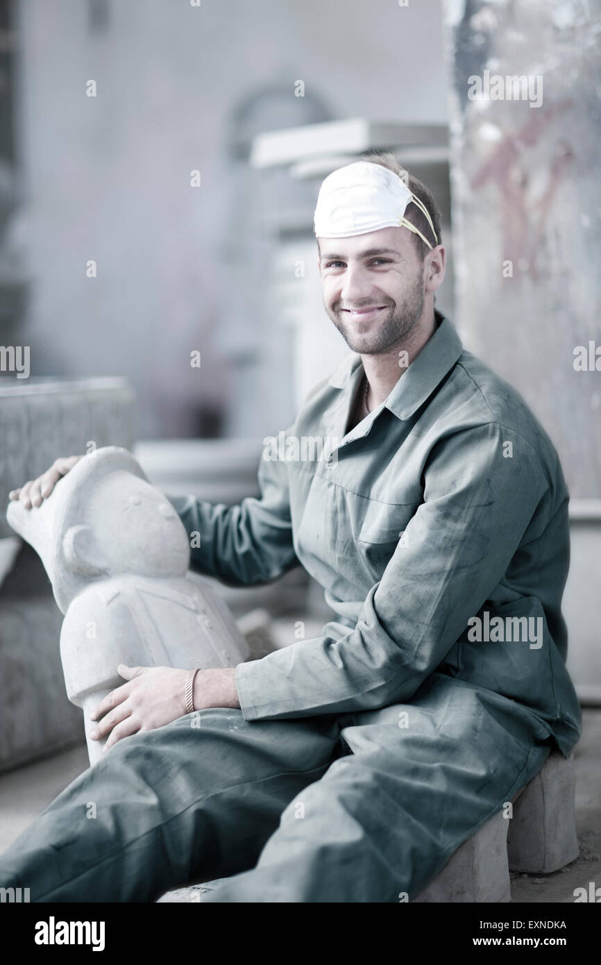 Clay factory worker Stock Photo - Alamy