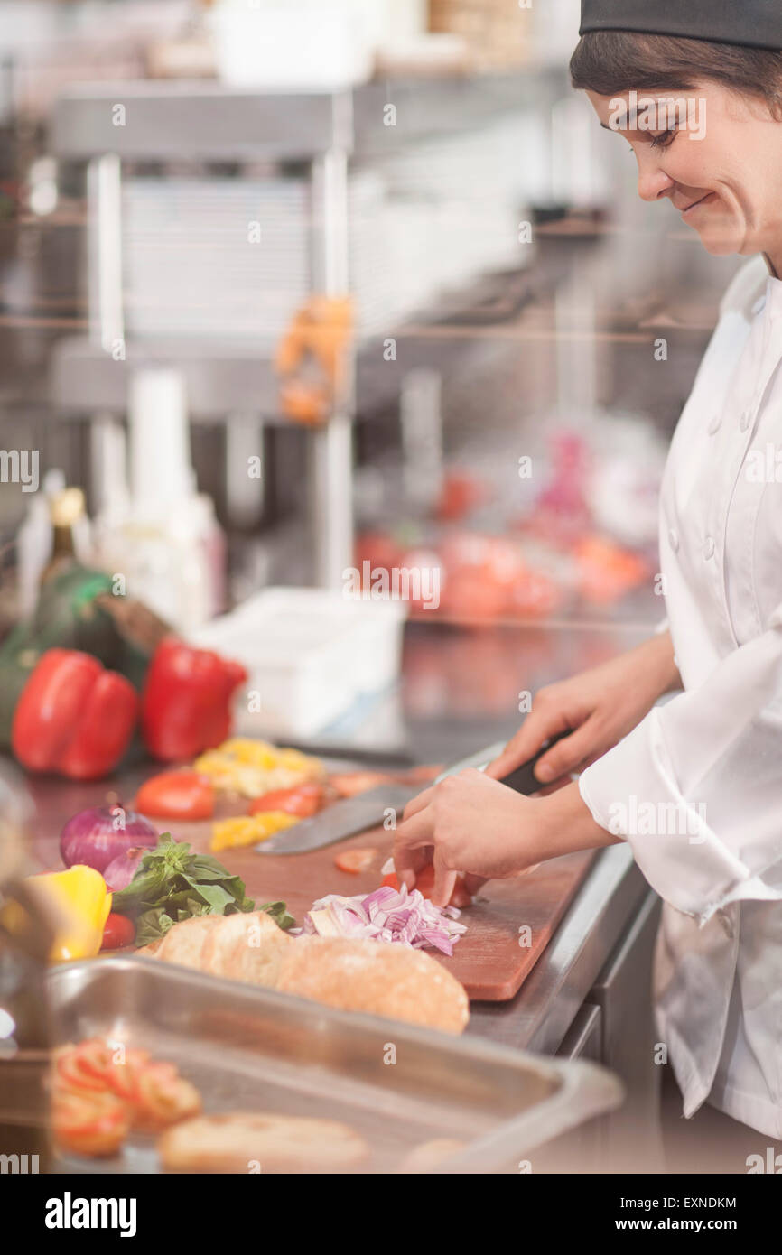 Chef preparing food in restaurant kitchen Stock Photo - Alamy