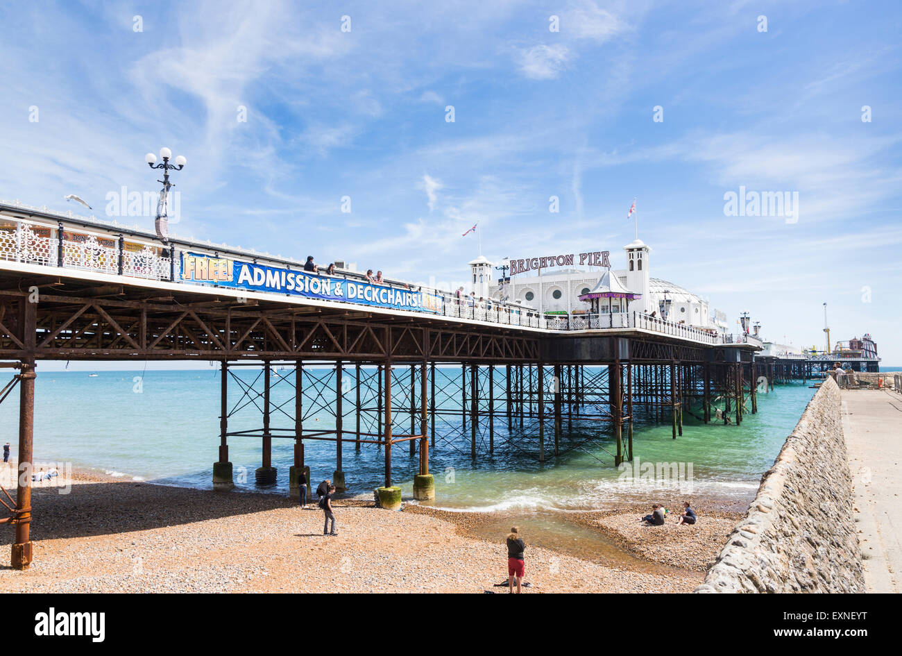 Victorian Palace Pier, or Brighton Pier, an iconic landmark, and beach ...