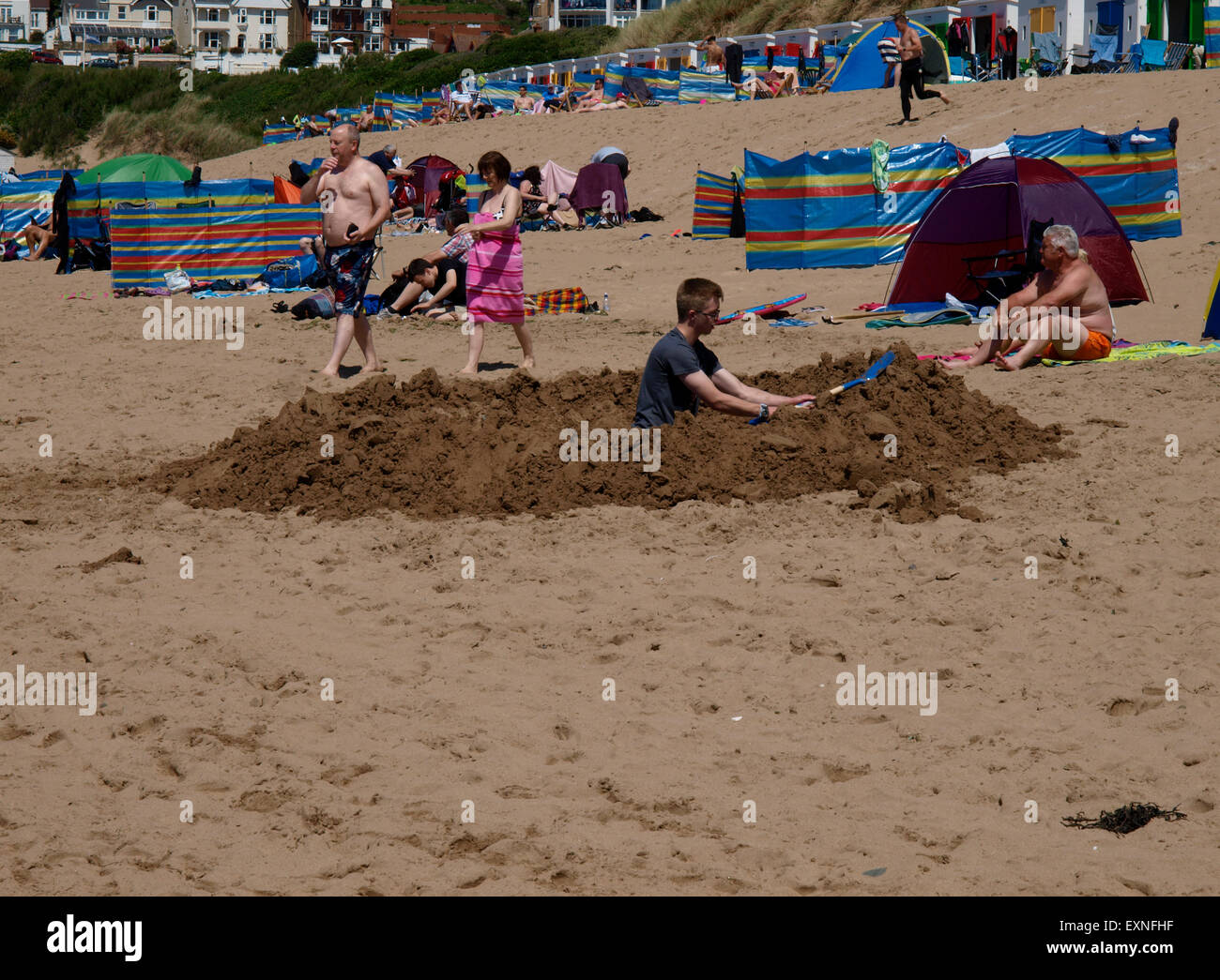 Digging A Hole At Beach