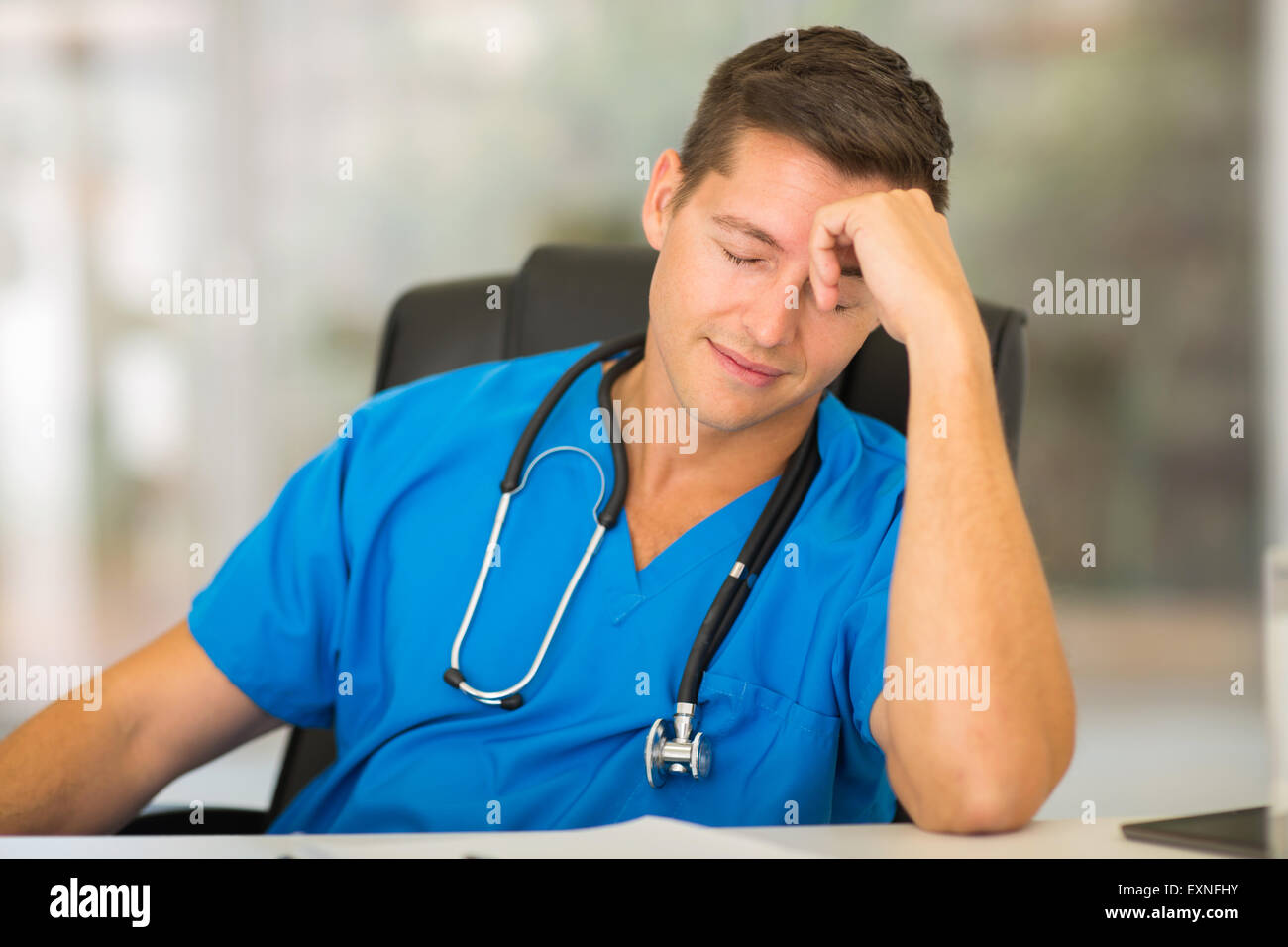 Portrait tired medical doctor hi-res stock photography and images - Alamy