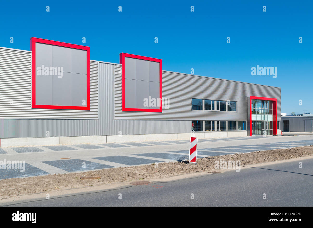 newly build modern red office building with warehouse Stock Photo - Alamy
